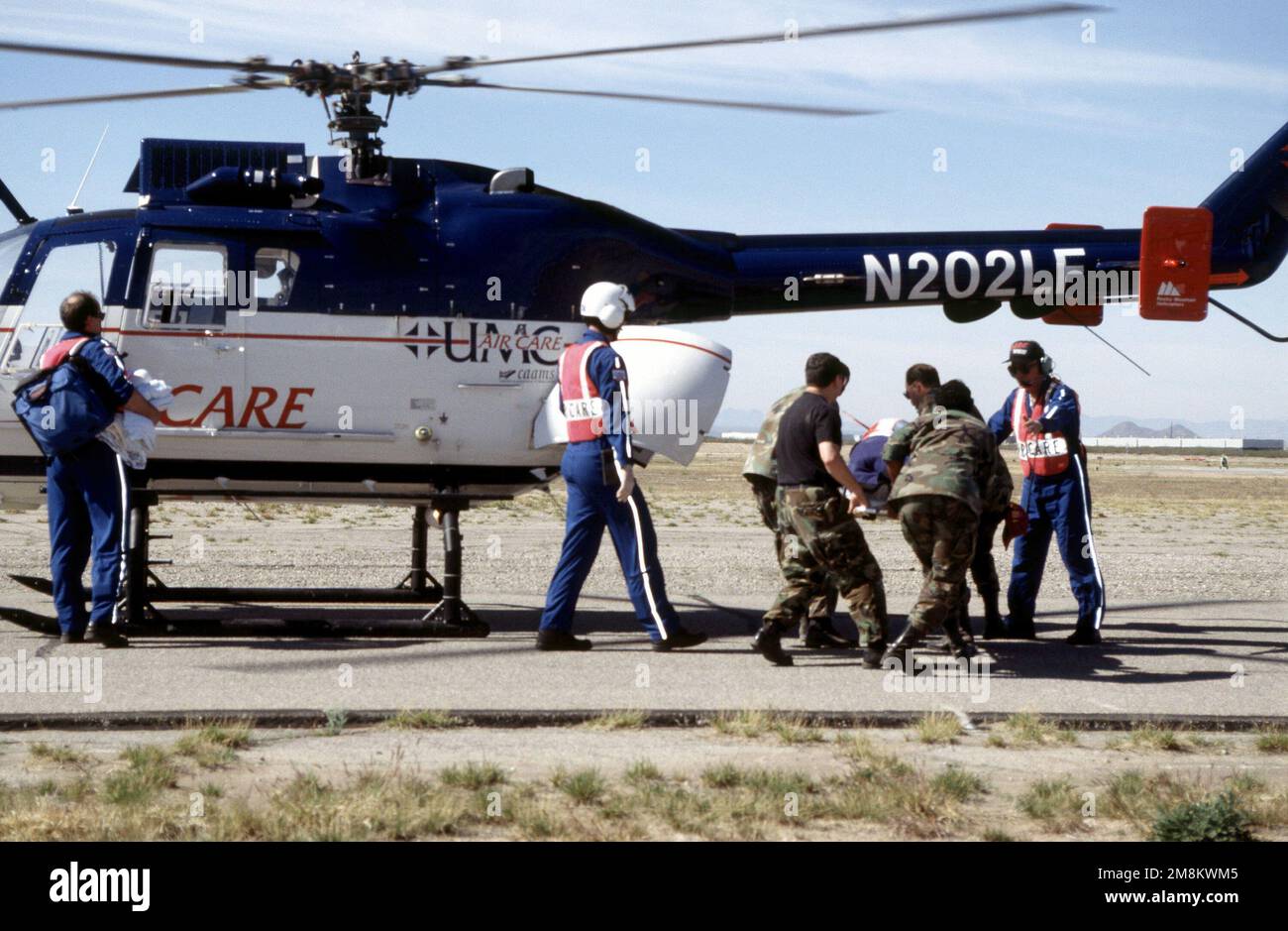 A "critically wounded victim" of a simulated air disaster is medevaced ...
