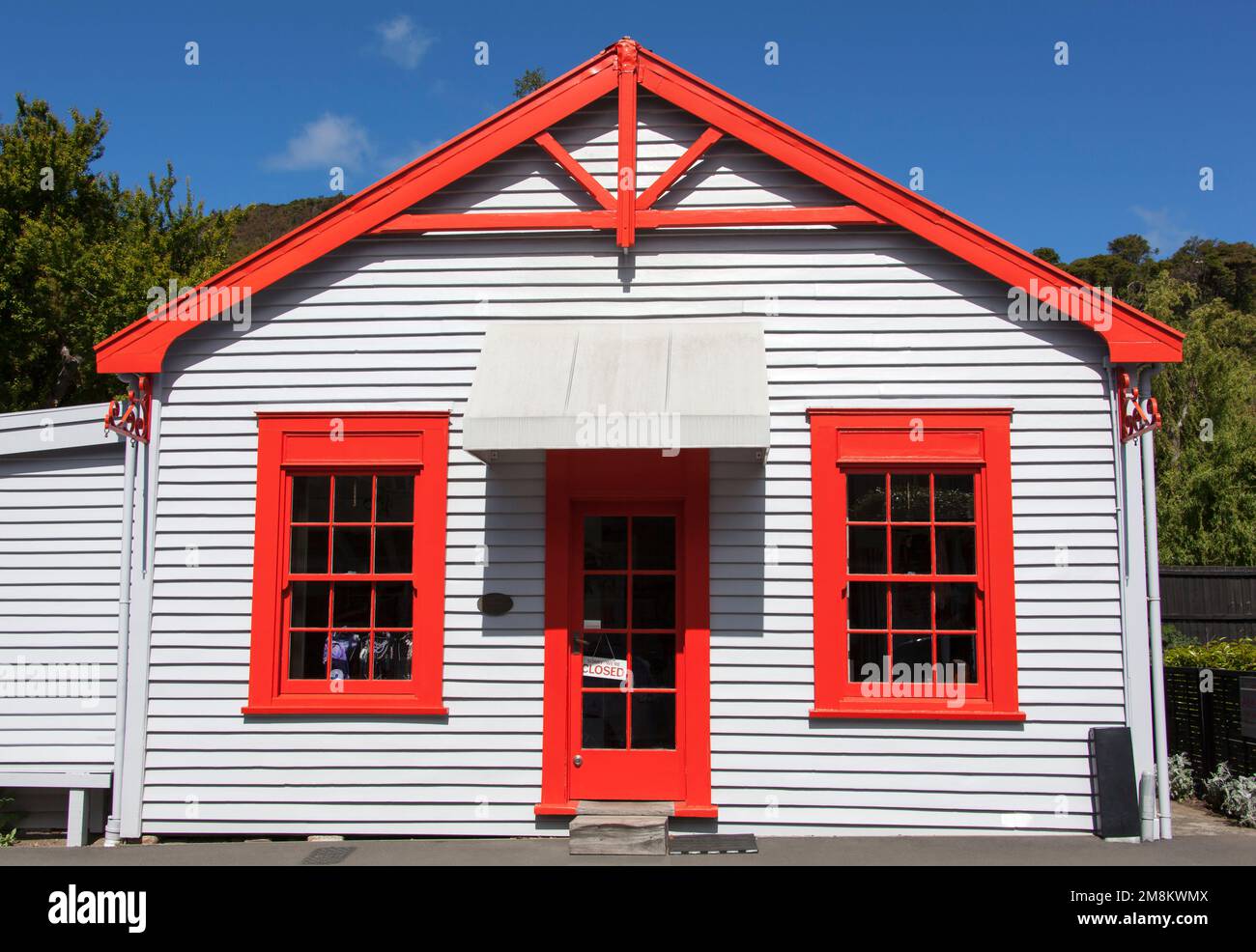 The red color store with 'closed' sign, the officially historic house ...
