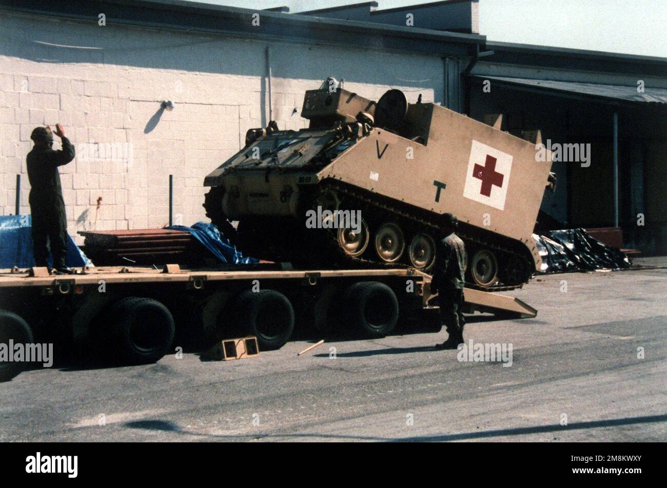 Elements of the 24th Infantry Division (Mechanized), load an armored ...