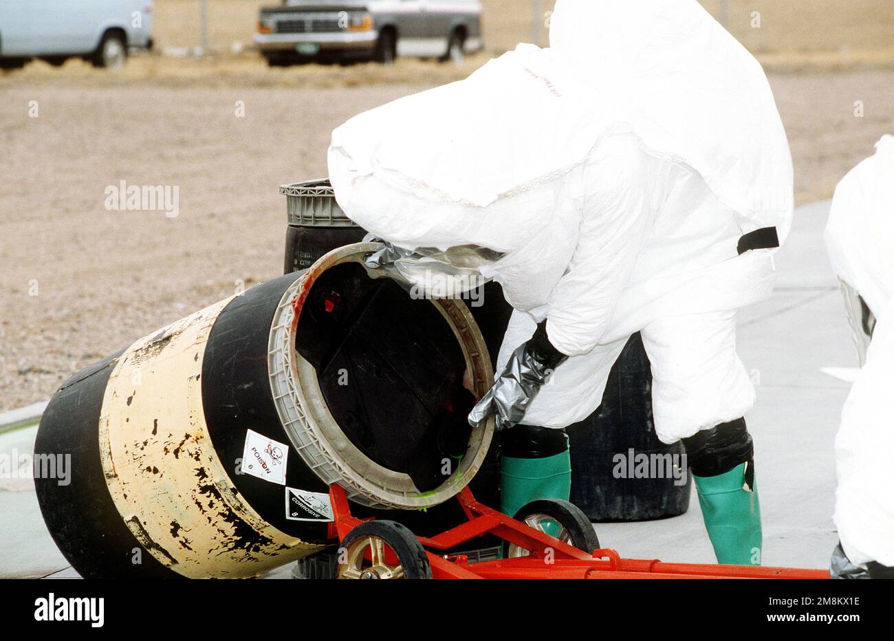 Dave Fritchie, with the 90th CES/CEF, dressed in a white protective ...