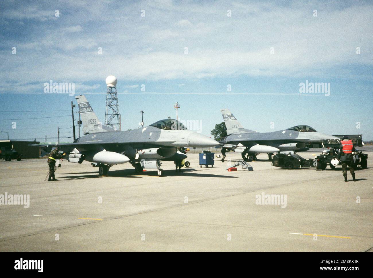 Two F-16 Fighting Falcons return from their mission, and their crew ...