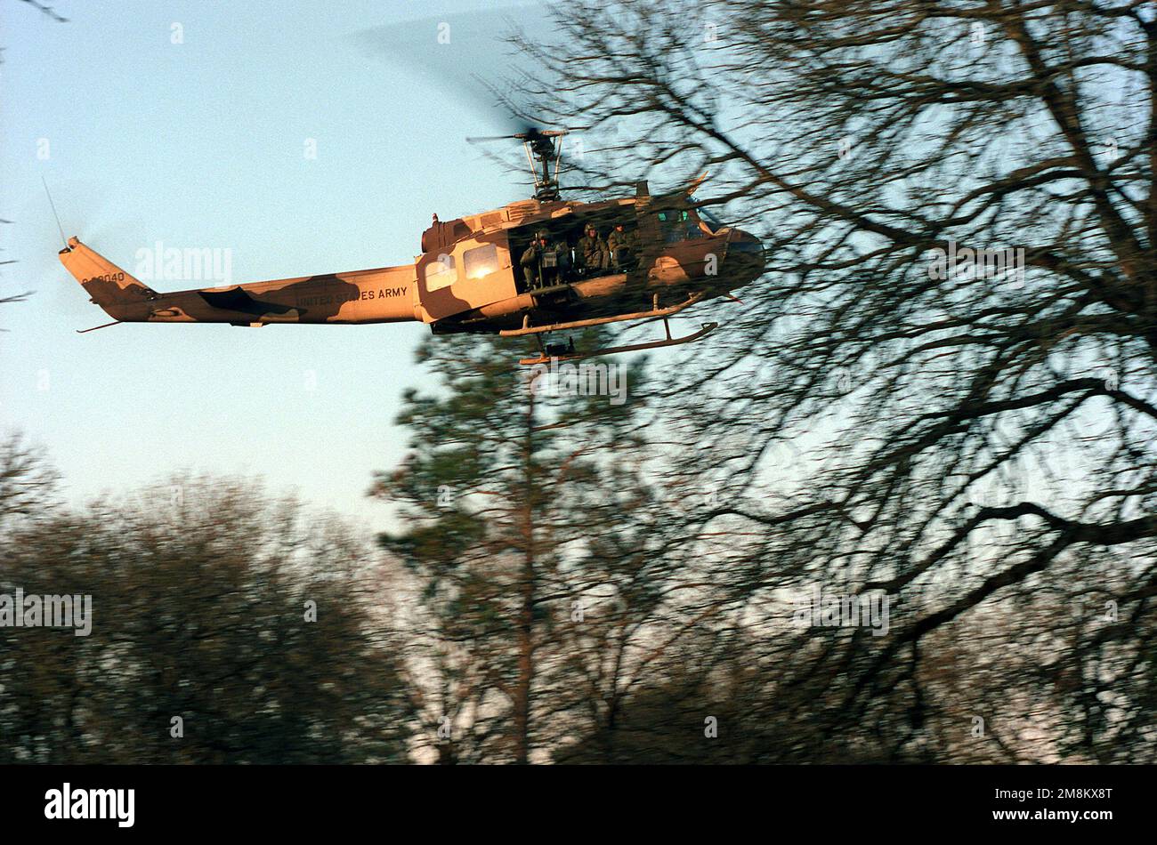 A UH-60 Black Hawk (Blackhawk) painted camouflaged is the opposing ...