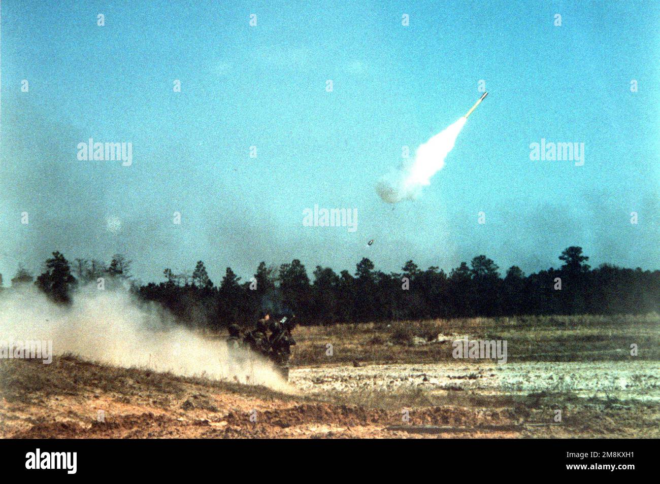 Troops from the 1ST of the 5th Antiaircraft Artillery Brigade fire the ...