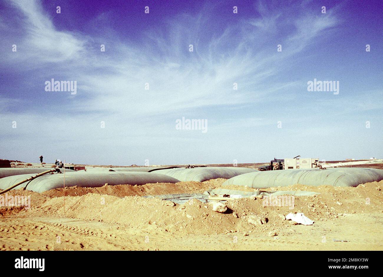 Overall view of the water bladders in tent city. The water supply will ...