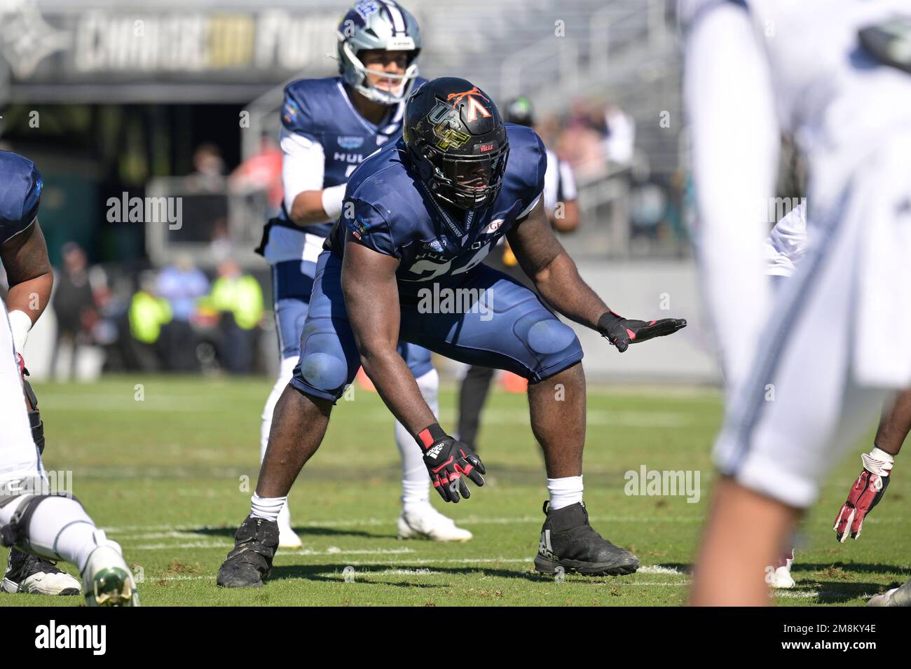 Team Aina offensive lineman Adonis Boone (74), of Louisville, sets up ...