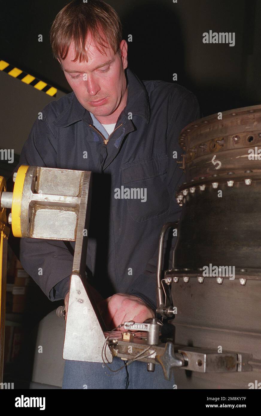 Aviation Structural Mechanic Second Class (AMH2) James T. McAllister is ...