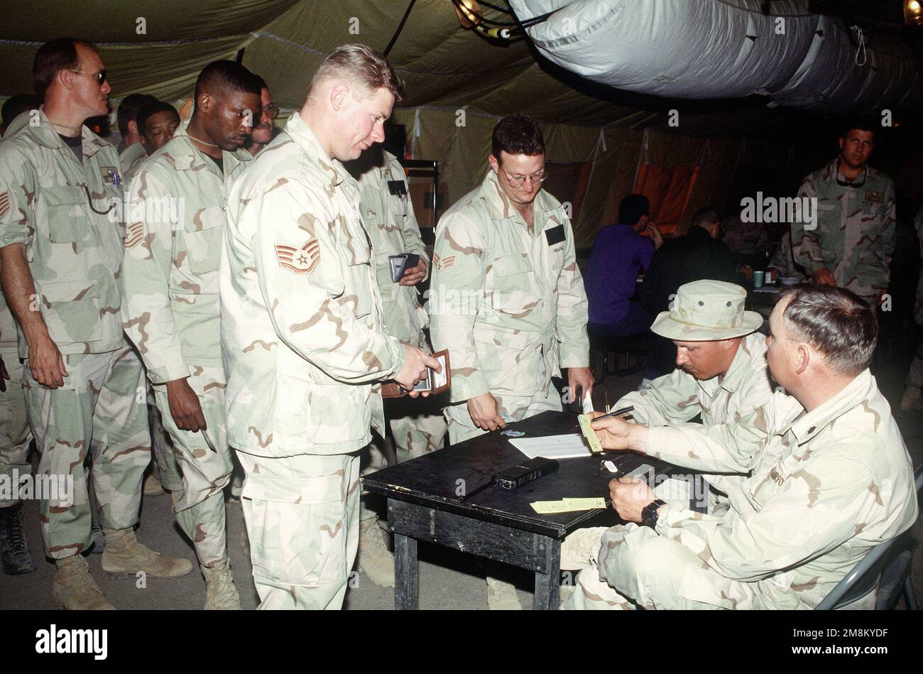 Lieutenant COL. Brookhart (Right) the 1ST Services Squadron's Commander ...