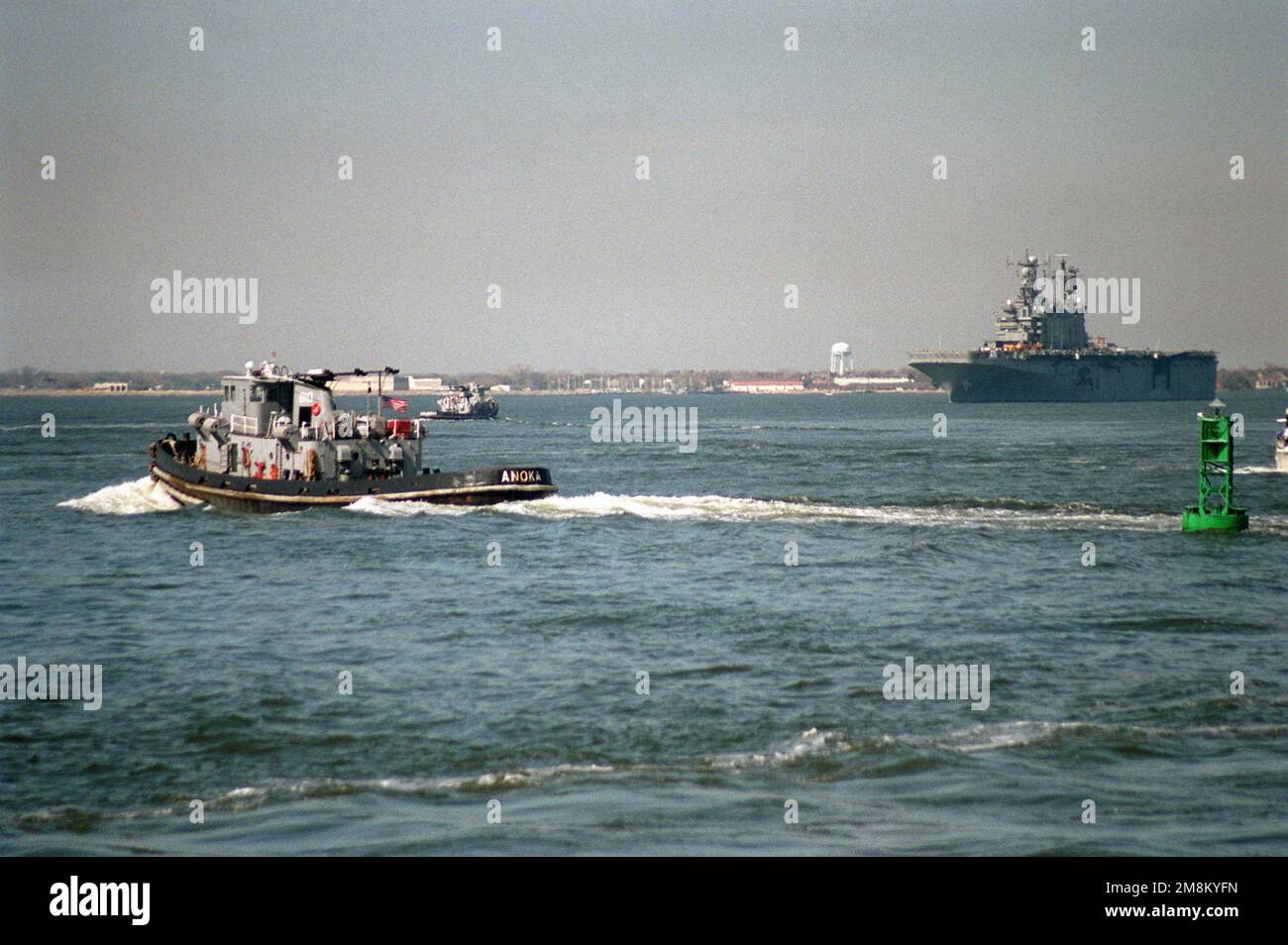 The large harbor tugs ANOKA (YTB-810) and DAHLONEGA (YTB-770) plus two ...