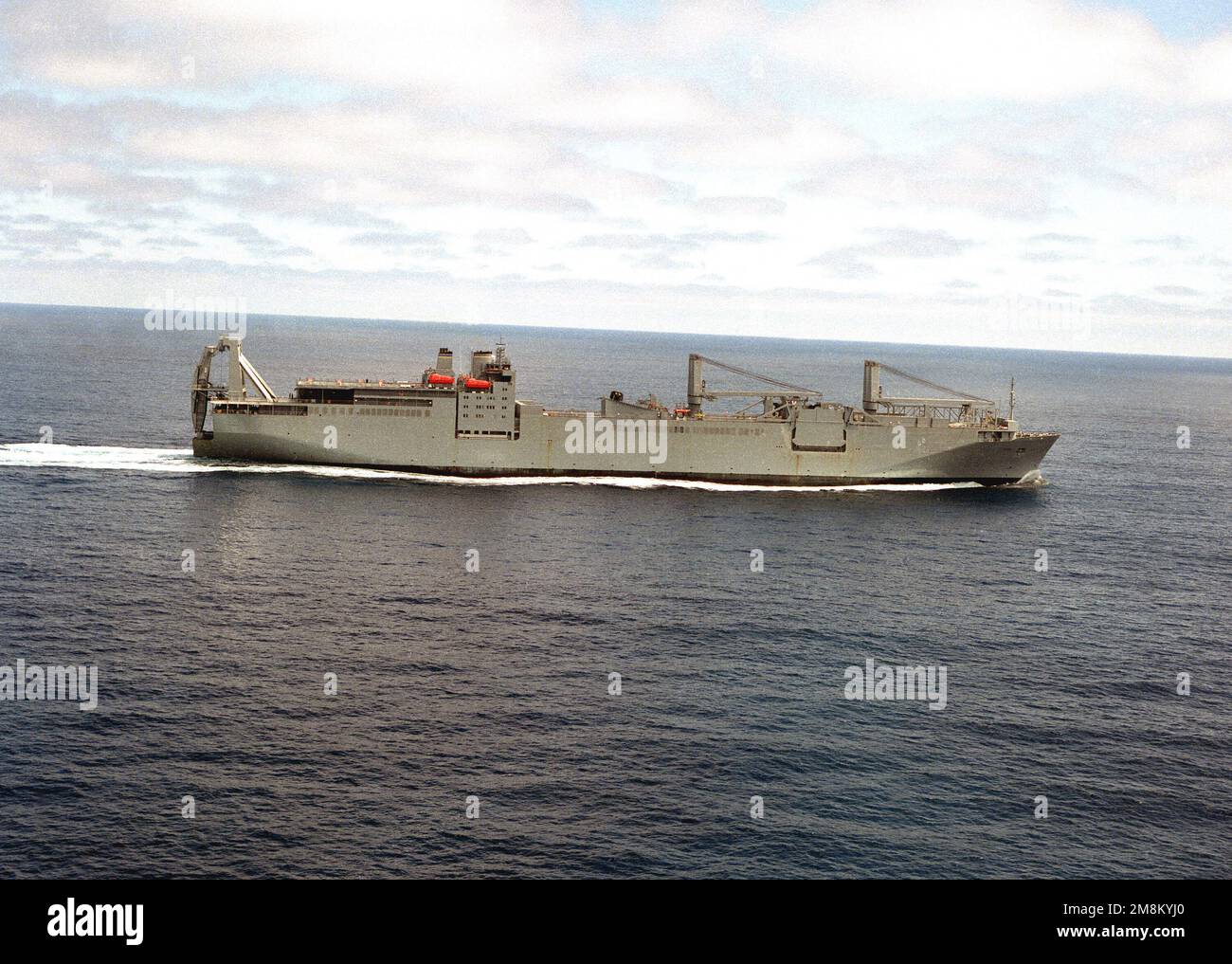 Low oblique aerial port beam view of the Military Sealift Command (MSC) vehicle transport ship ...