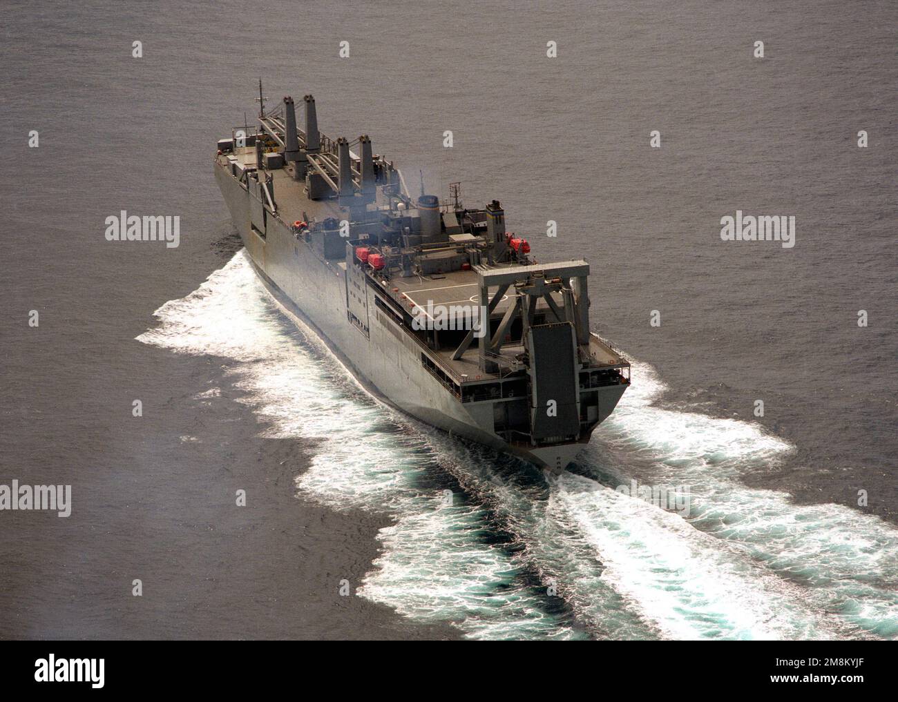 High oblique aerial port quarter view of the Military Sealift Command (MSC) vehicle transport ...