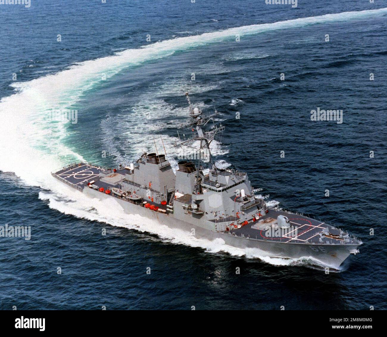 An aerial starboard bow view of the guided missile destroyer USS ...