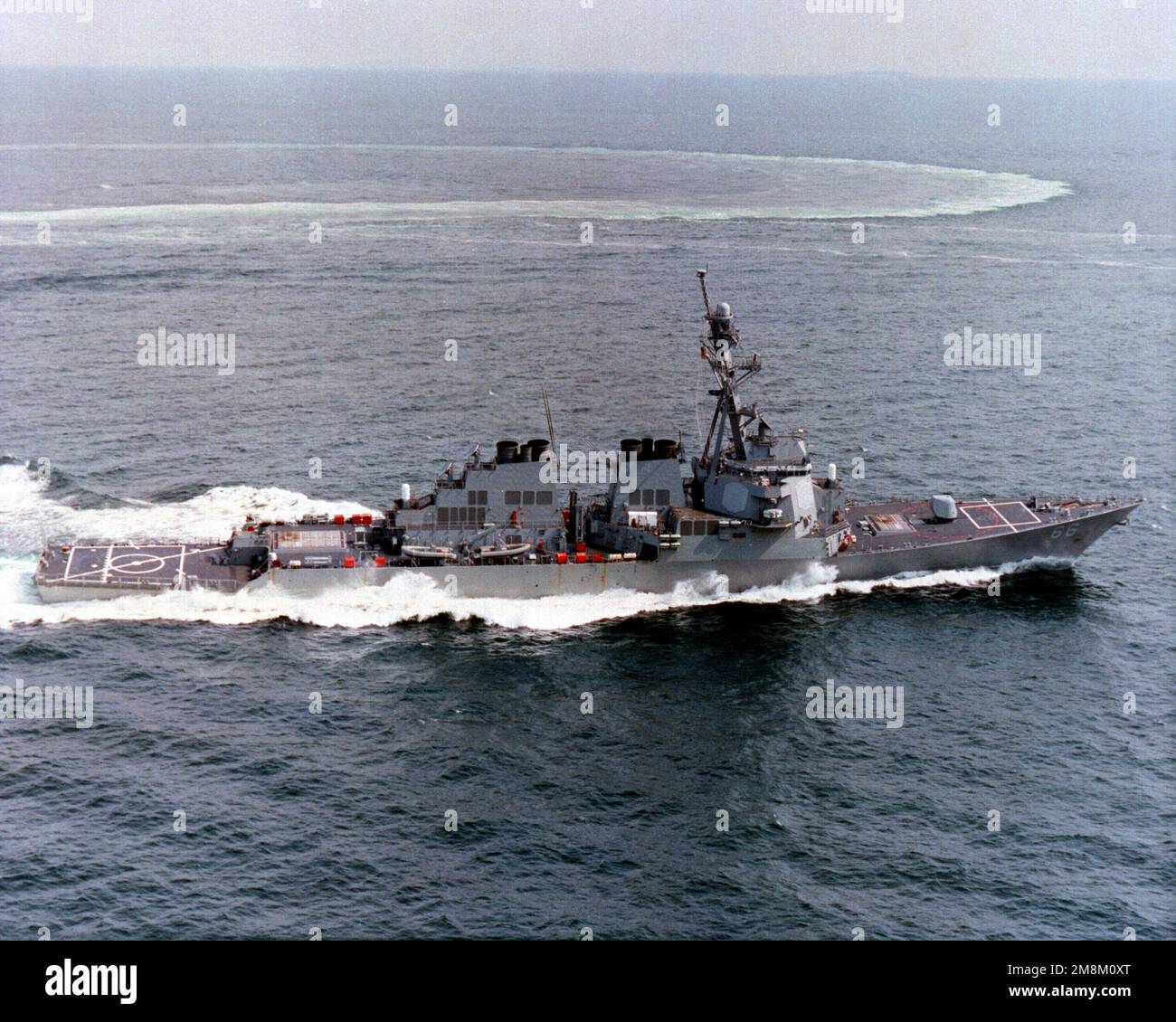 A low oblique aerial starboard beam view of the guided missile ...