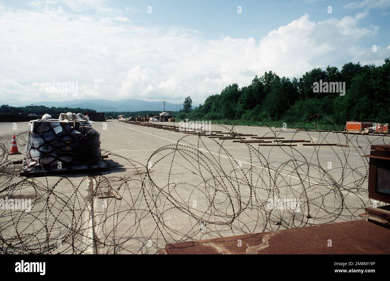 Cargo storage area at the Tuzla Air Base airfield ramp. Subject ...