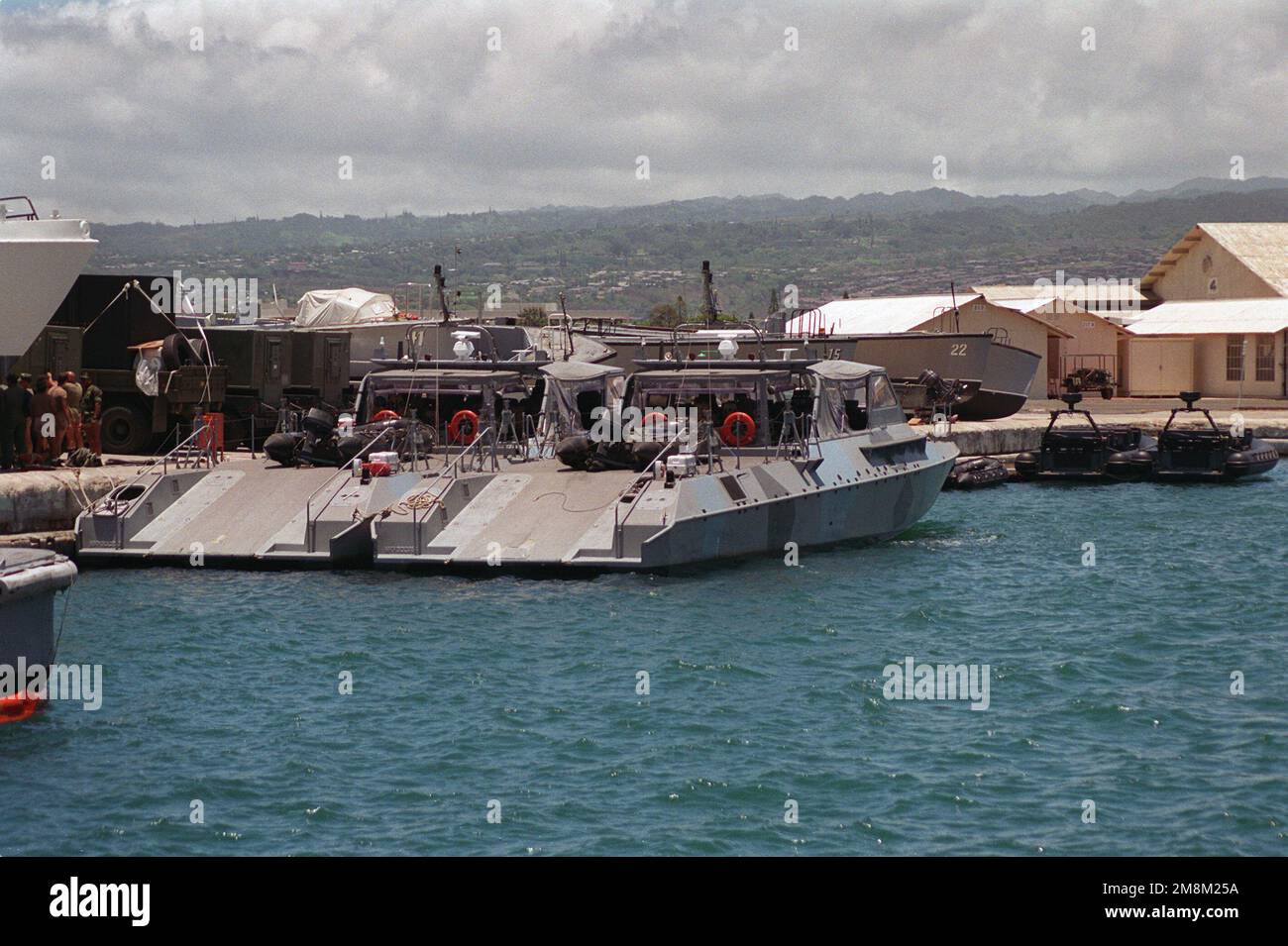 A starboard quarter view of two Halter Marine Mark VI combatant craft ...