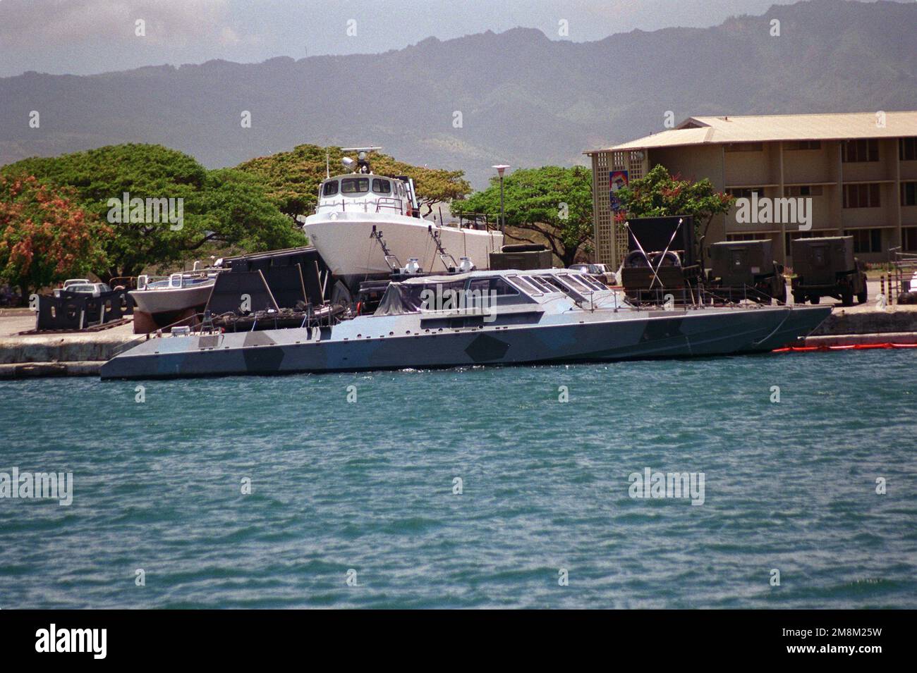 Starboard side view of two Halter Marine Mark VI combatant craft tied ...