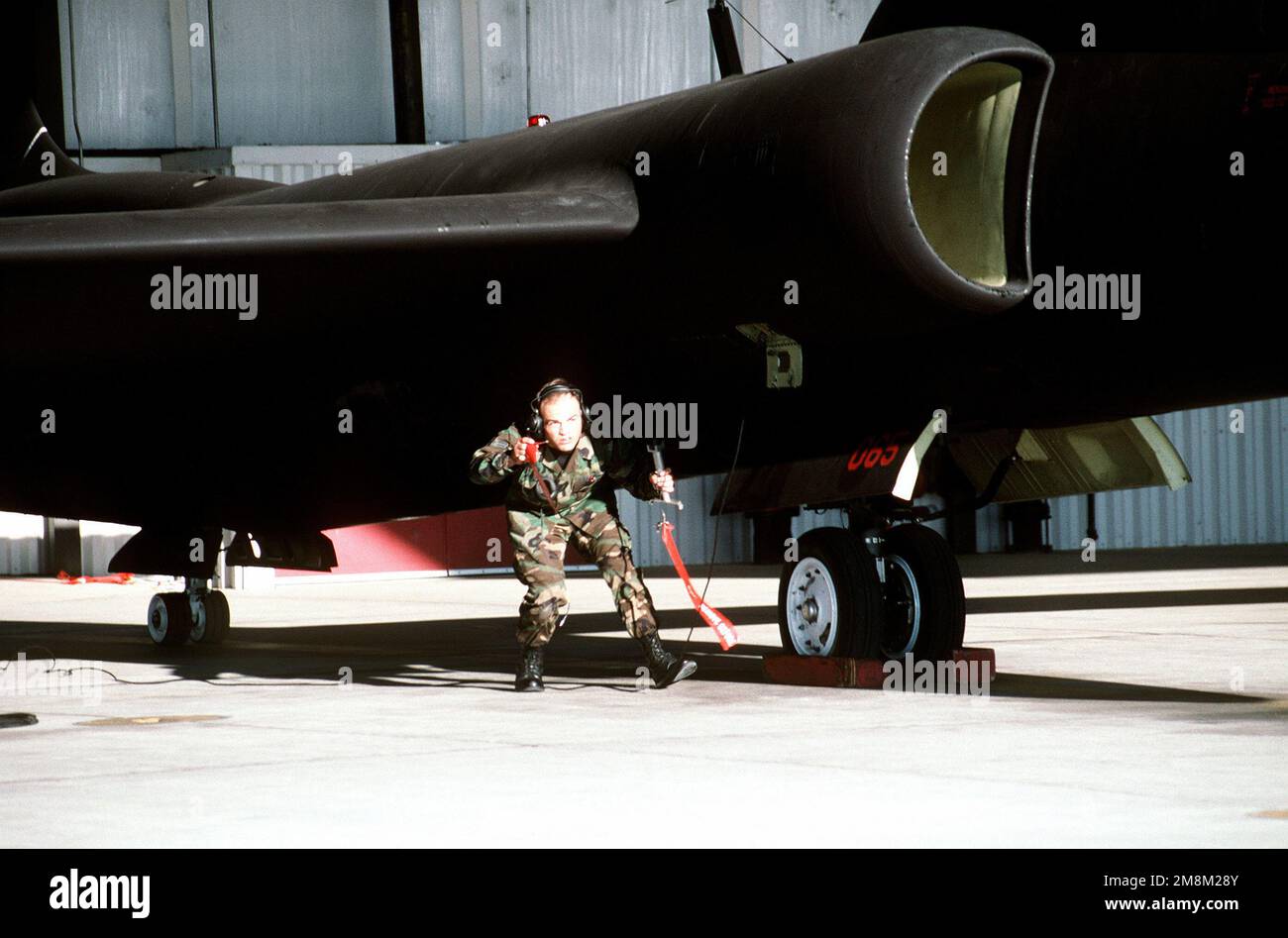 AIRMAN 1ST Class Mark N. Stevens, U-2 crew chief, shows the ground ...