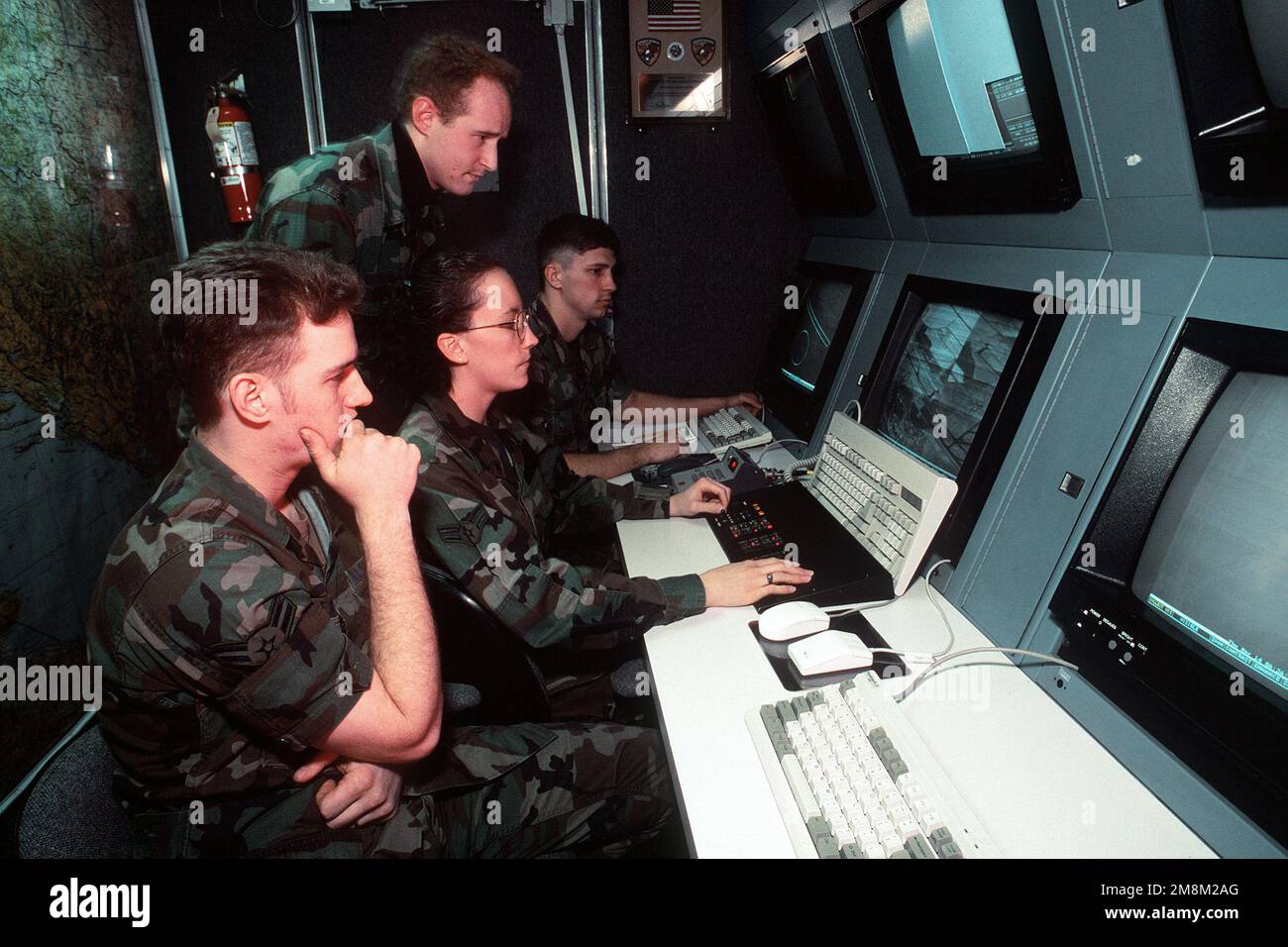 Imagery specialists from the 13th Intelligence Squadron work at ...