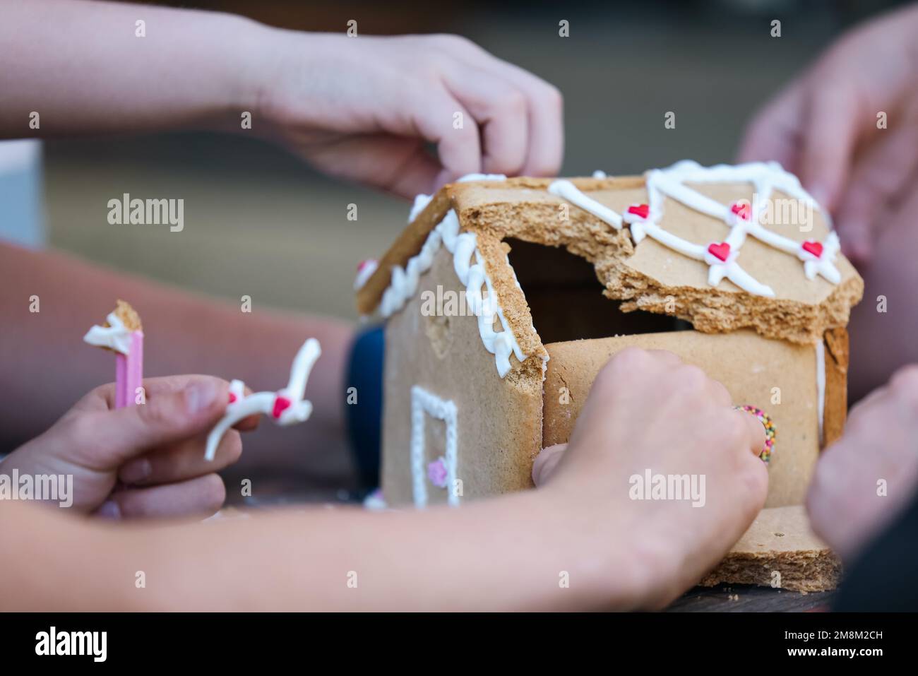 Hands pulling apart hi-res stock photography and images - Alamy