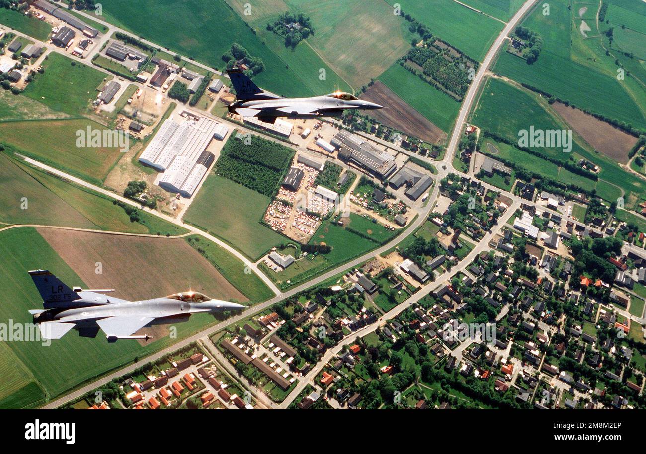 Air to air view of two Air Force Reserve F-16 Fighting Falcons flying ...
