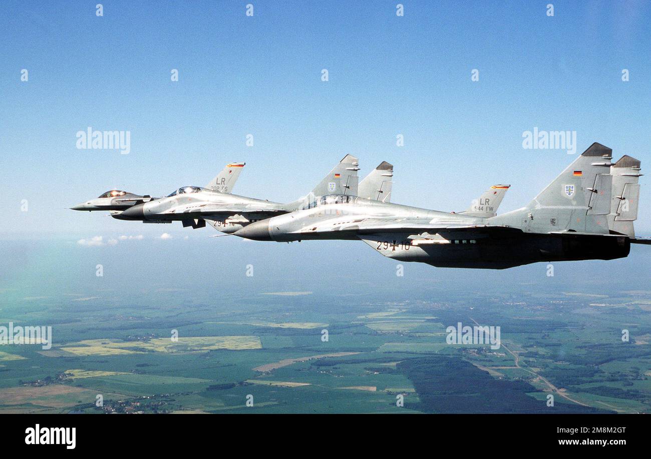 Air to air view of two German Air Force MIG-29 fighters and two Air ...