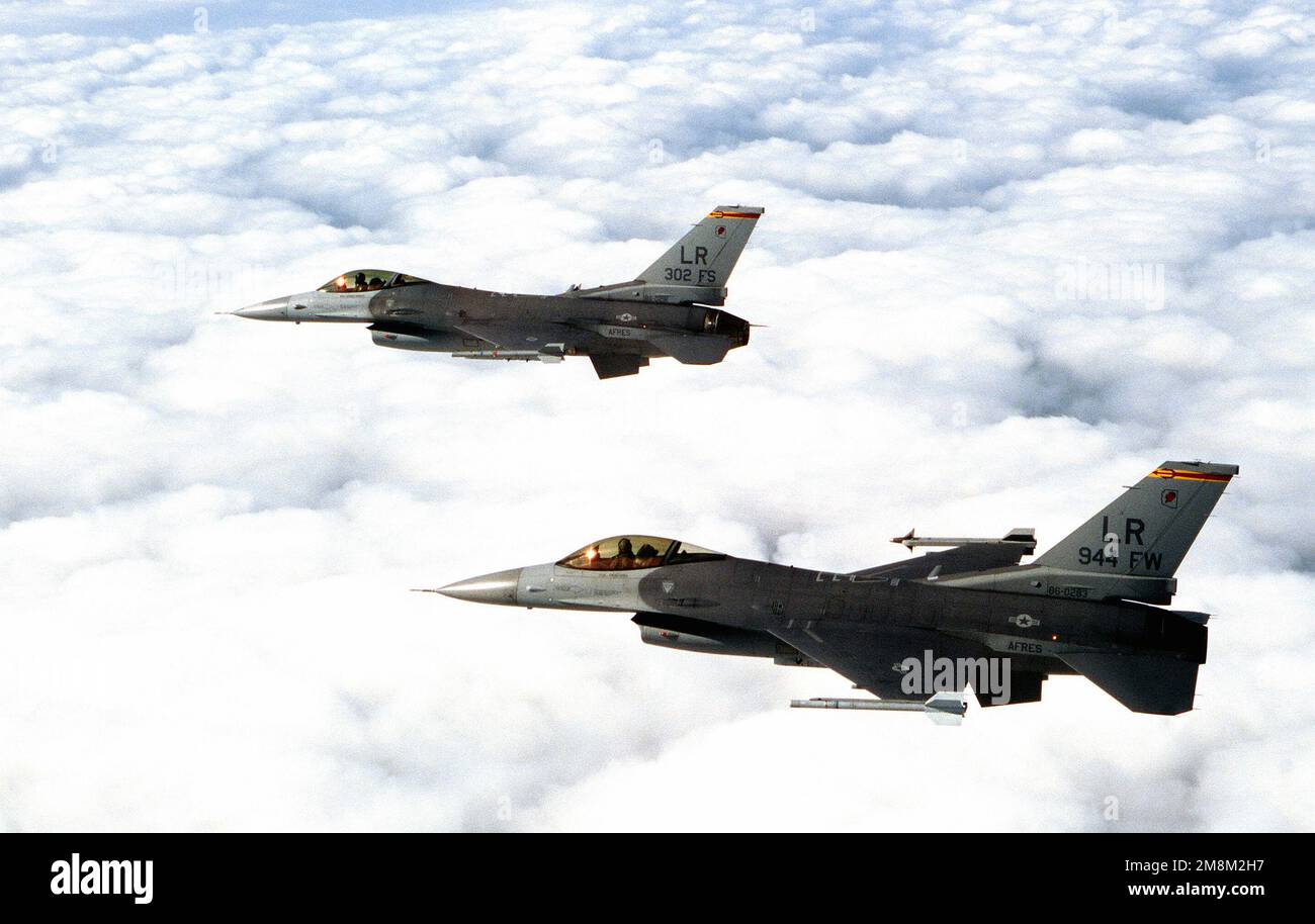 Air to air view of two Air Force Reserve F-16 Fighting Falcons flying ...