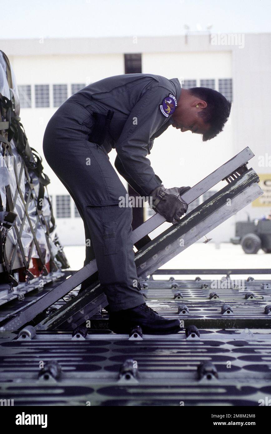 STAFF SGT. Roland Reves, loadmaster, 21st Airlift Squadron, Travis Air ...