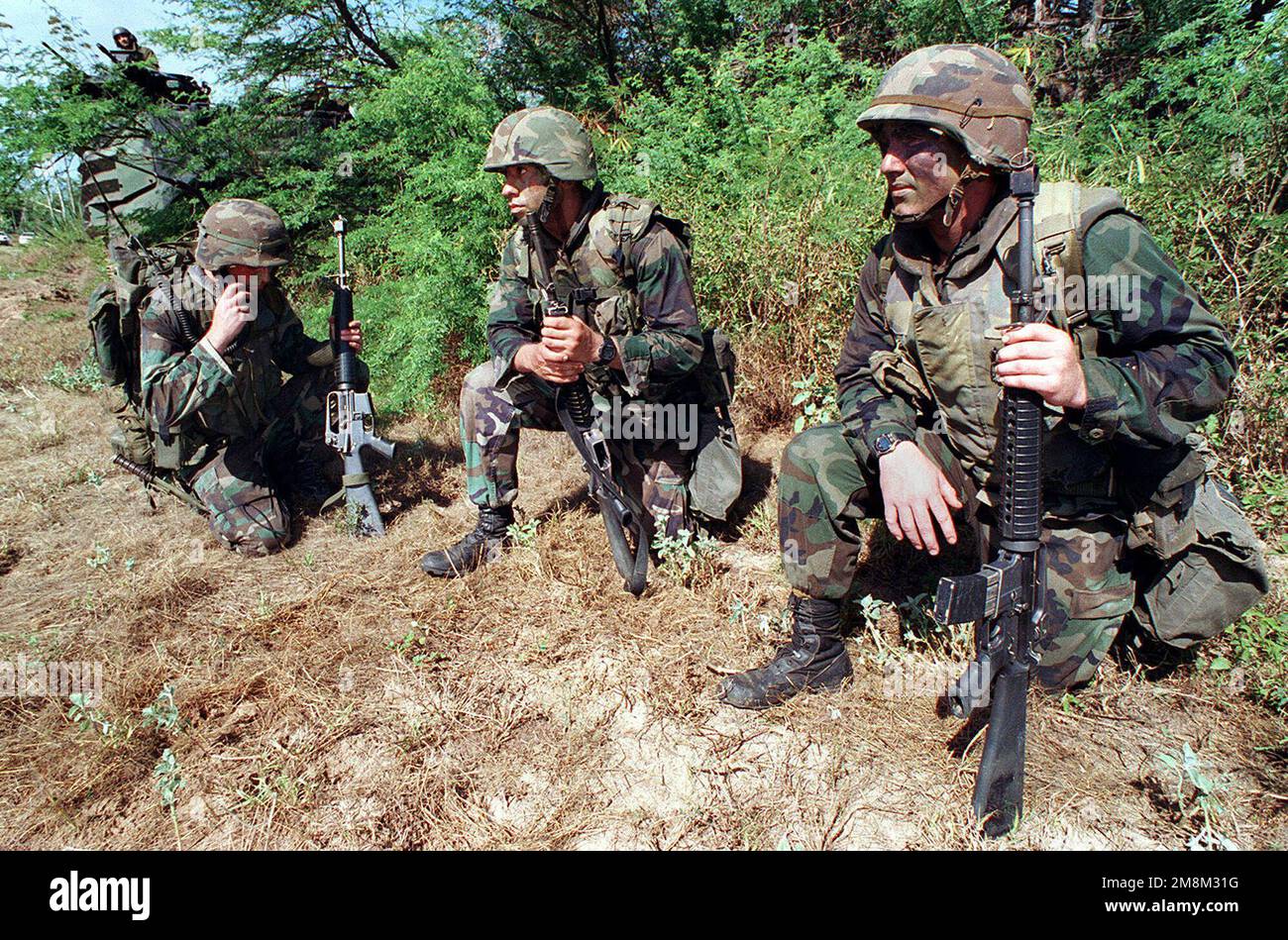 US Marine Corps First Lieutenant (1LT) Haytham Faraj (center) and ...