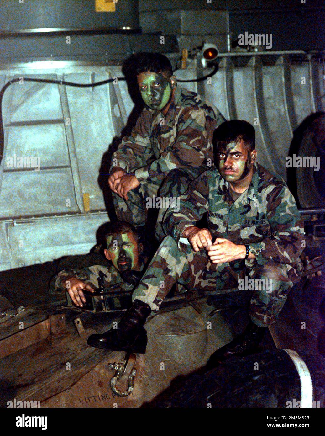 US Marine Corps Lance Corporal Jesus C. Cardenas (center), US Marine ...