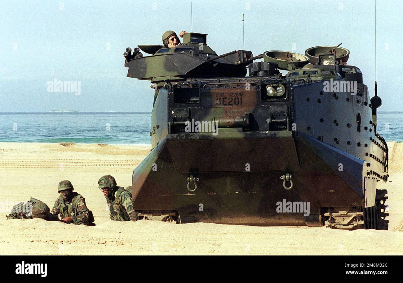 A front view medium close up of a US Marine Amphibious Assault Vehicle ...