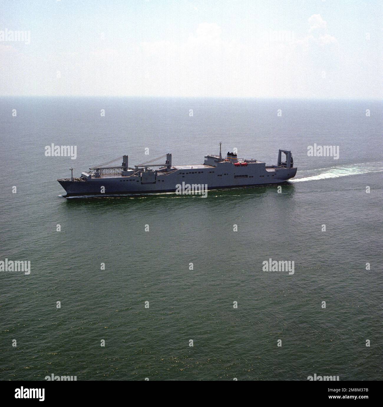 Aerial port side view of the Military Sealift Command (MSC) vehicle transport ship USNS Gordon ...