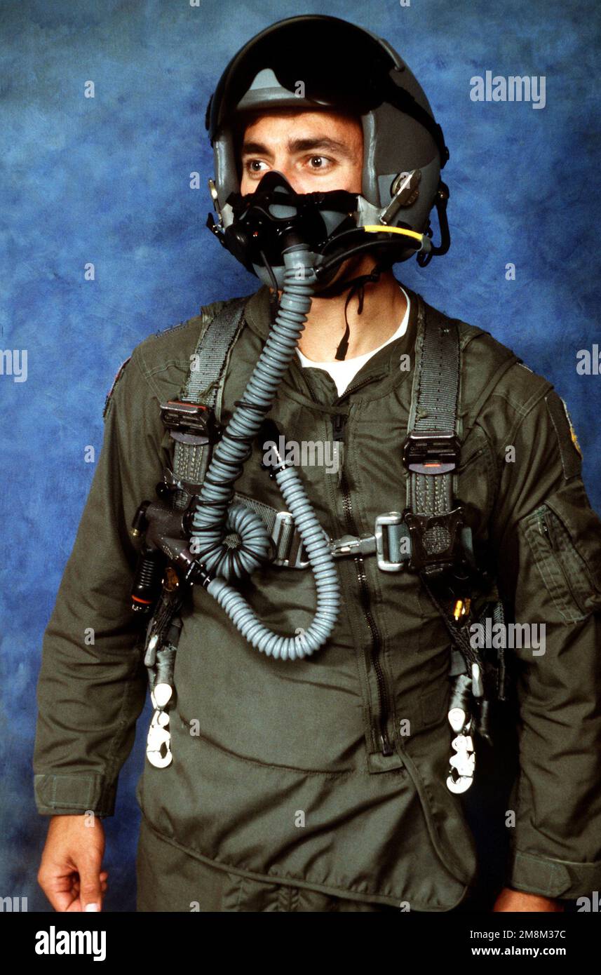 A front view of 1ST LT. Jim Burmeister wearing the new vest, mask, and ...