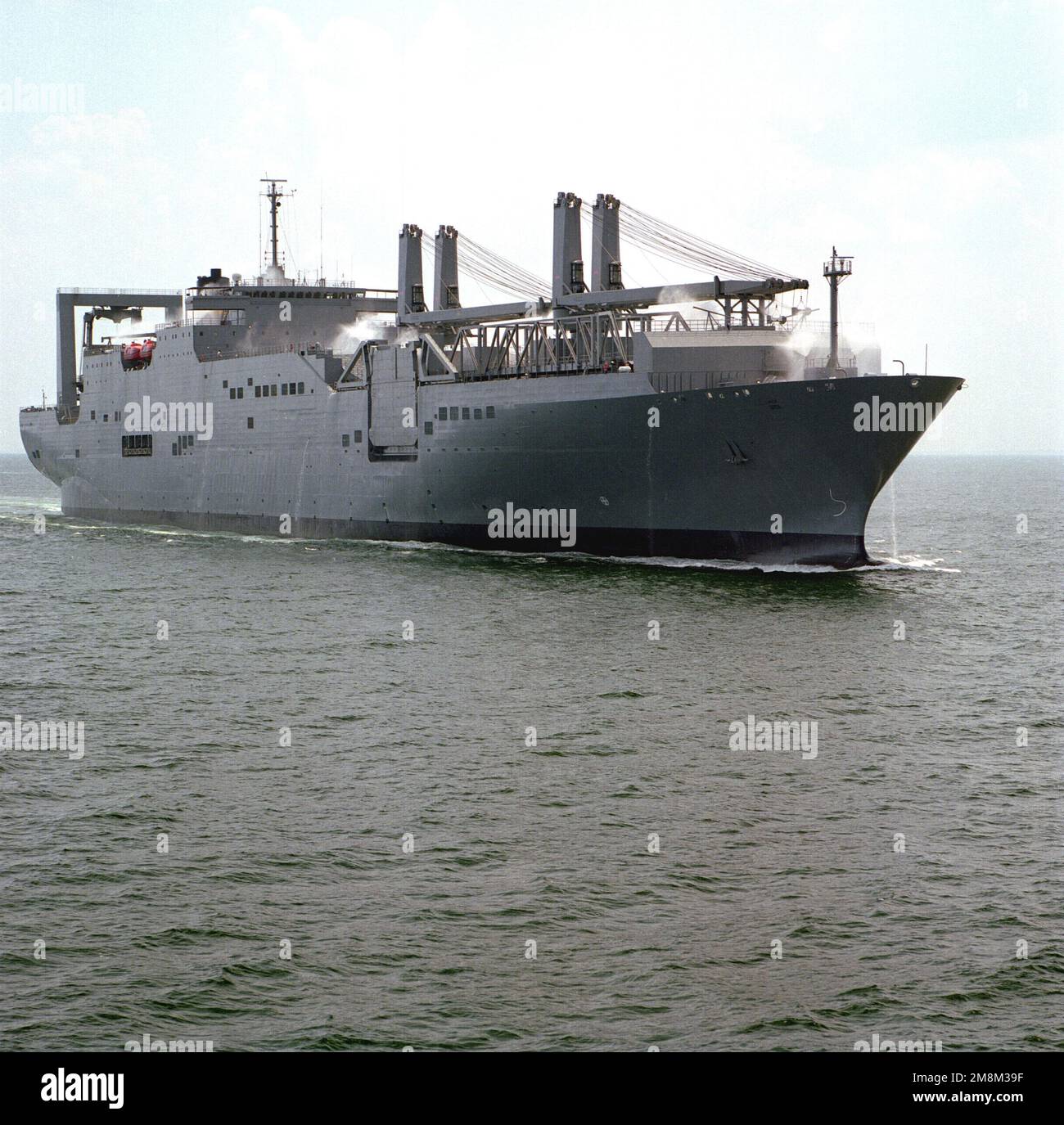 Aerial starboard bow view of the Military Sealift Command (MSC) vehicle transport ship USNS ...