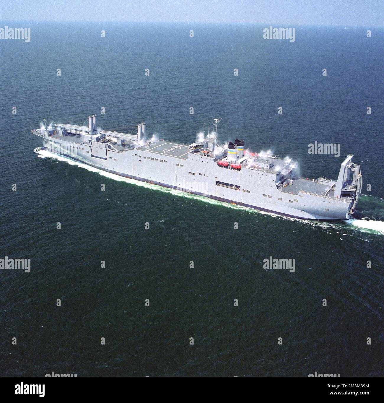 Aerial port quarter view of the Military Sealift Command (MSC) vehicle transport ship USNS ...