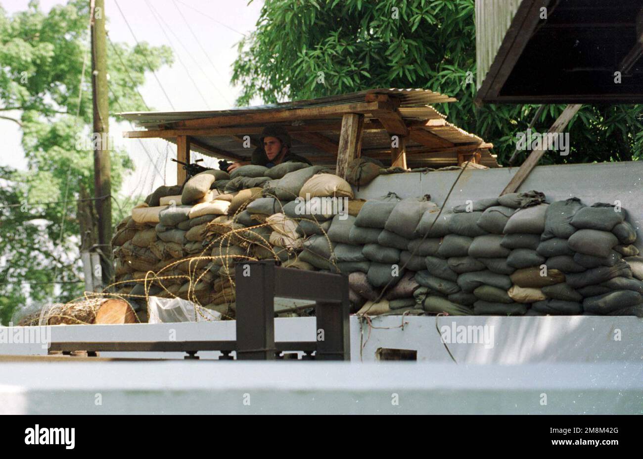 A soldier stands guard at Post 2 at the US Embassy. Special Purpose ...