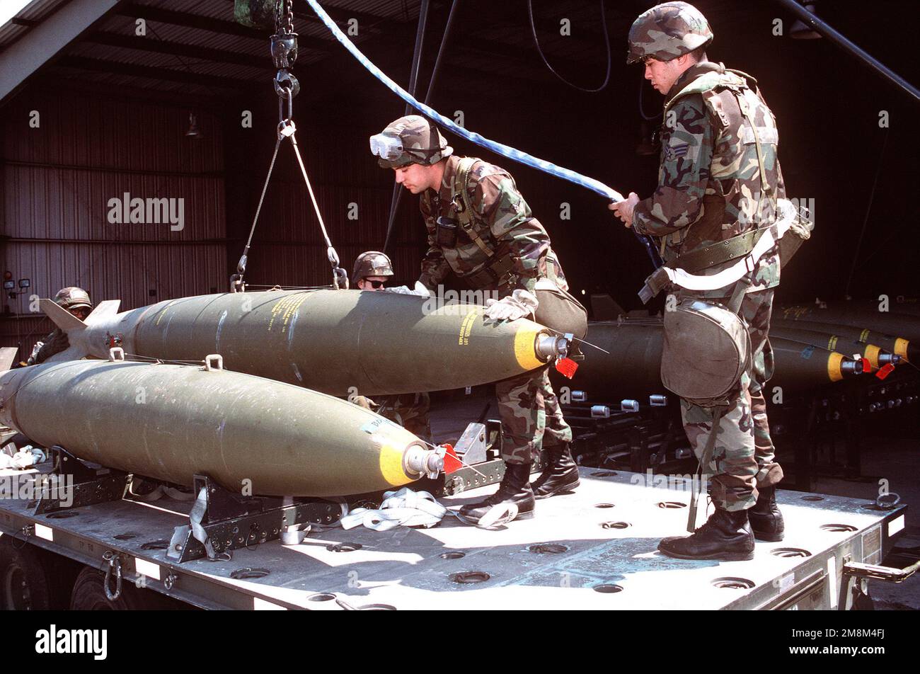AIRMAN Shawn Tubbs (left) and SENIOR AIRMAN Mike Fernandez, 35th Munitions Squadron, Misawa AB ...