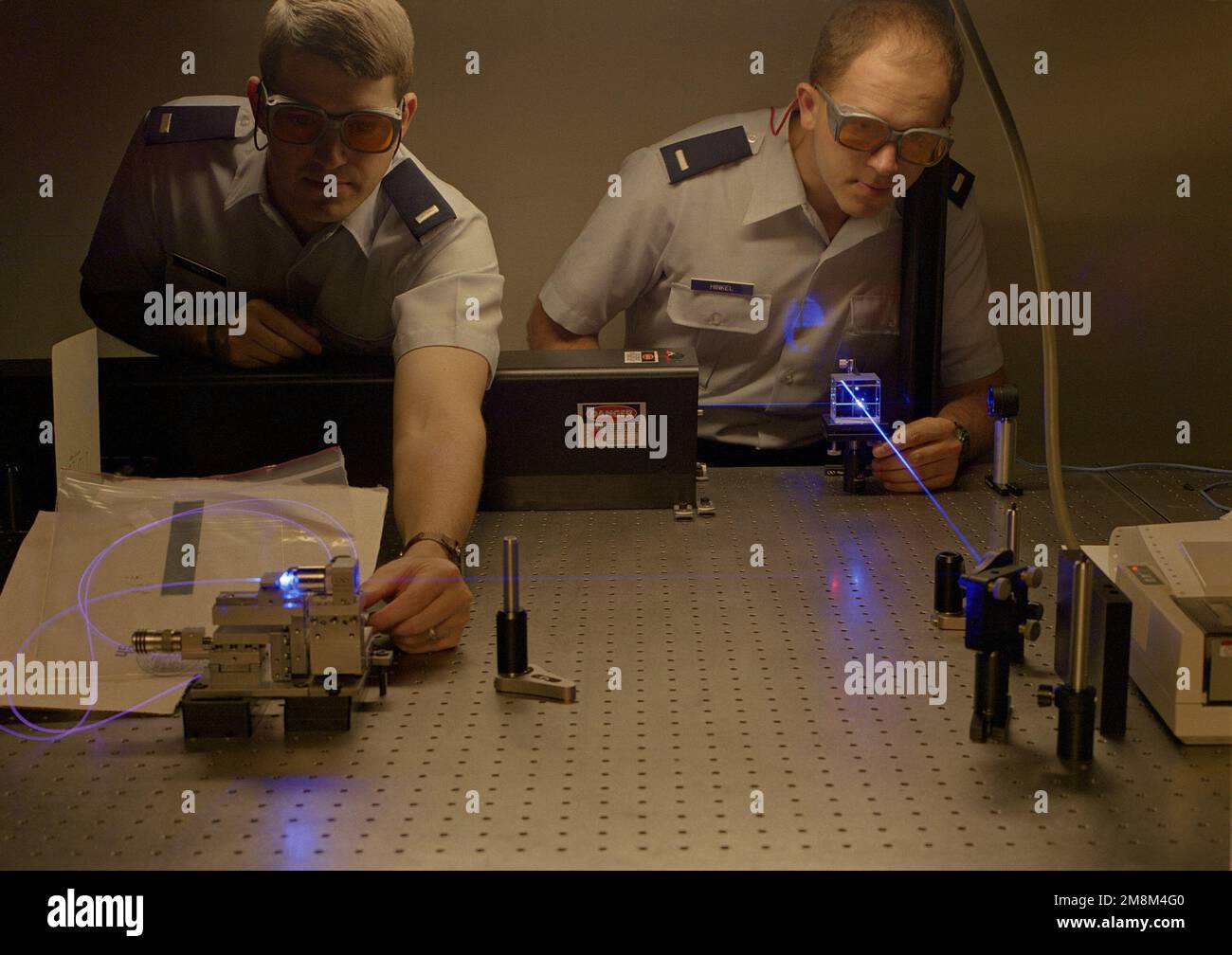 1LT Weist (left) and 1LT Hinkle set up a laser experiment in the ...