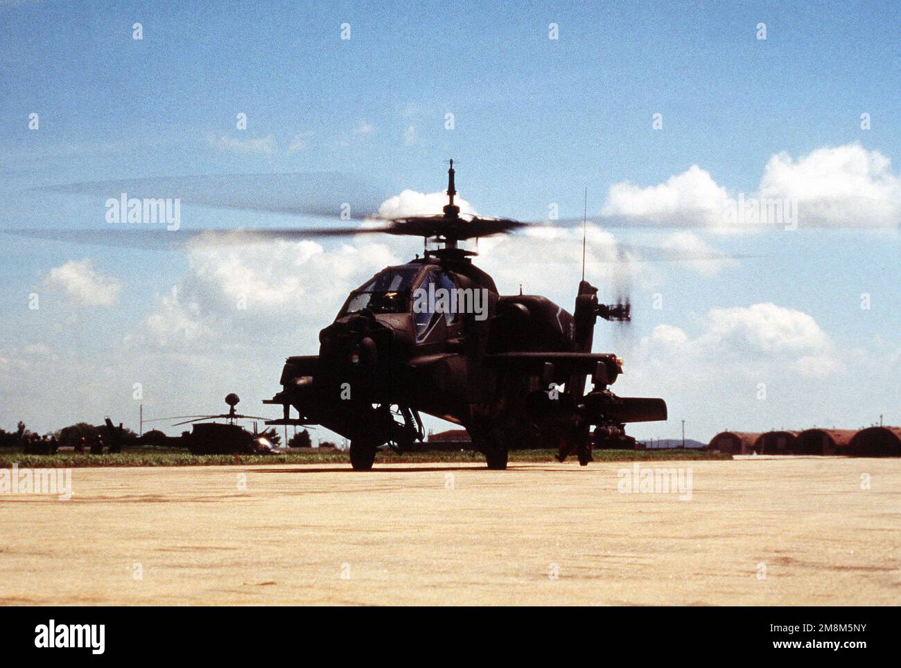 Left front view of an AH-64 Apache helicopter at Chick Do Island. Base ...