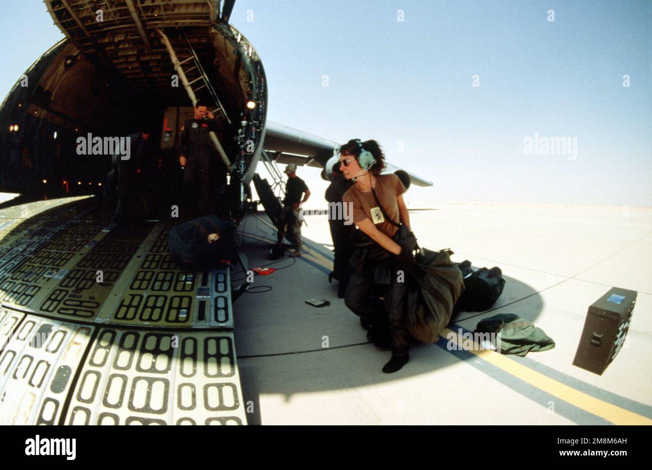 SENIOR AIRMAN Dara Carter, a loadmaster from the 21st Airlift Squadron ...