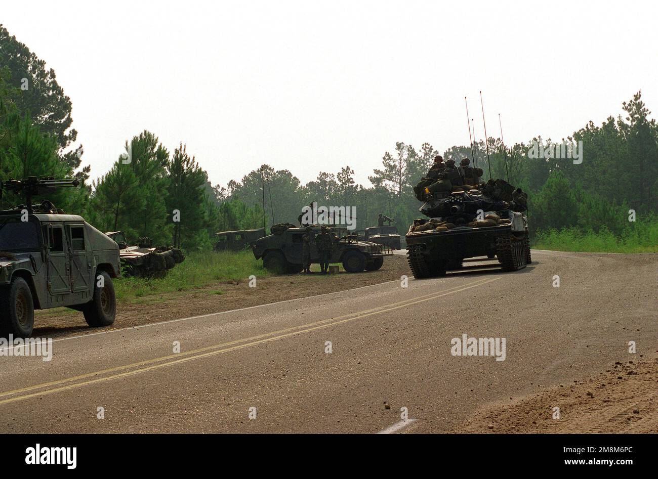 Heavy armor and High-Mobility Multipurpose Wheeled Vehicles (HMMWV), on ...