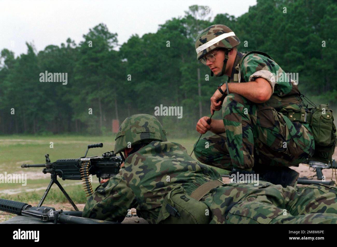 A US Marine instructor from 2nd Battalion, 6th Marines watches a Polish ...