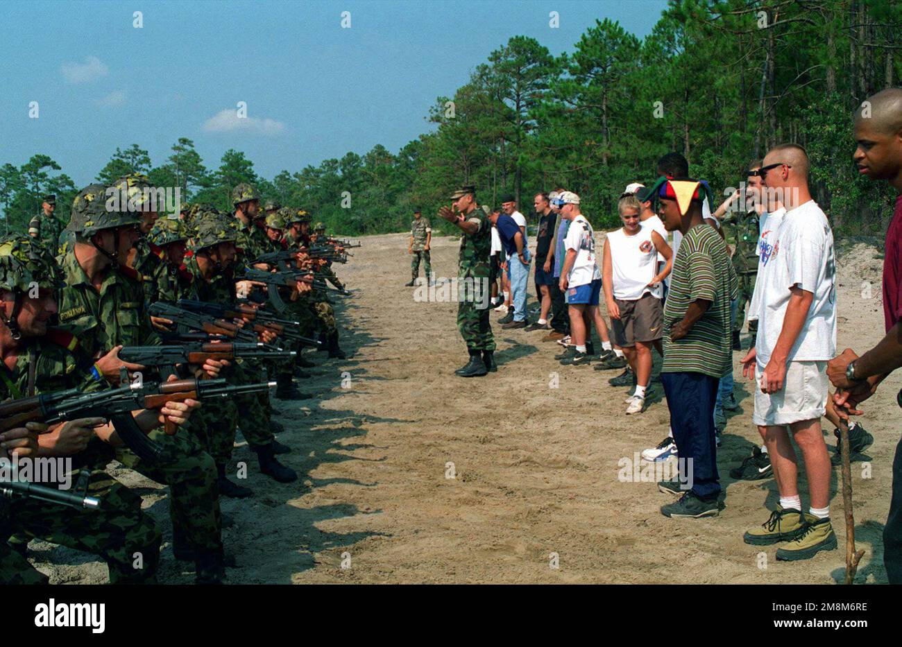 Romanian Soldiers armed with AK-74 assault rifles with folding stocks ...