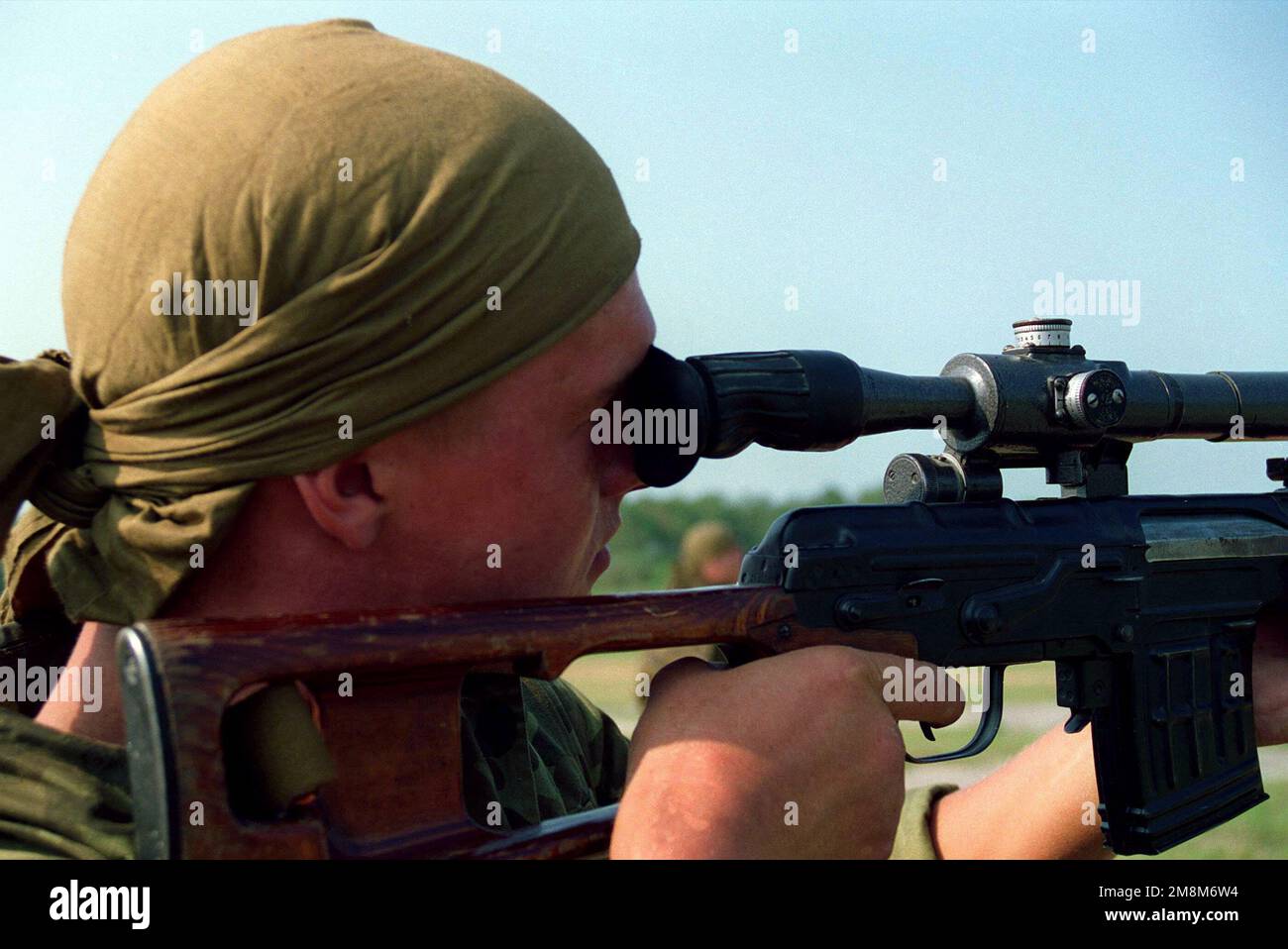 A Kazakhstan Soldiers, members of company 5, sights through the PSO-1 ...