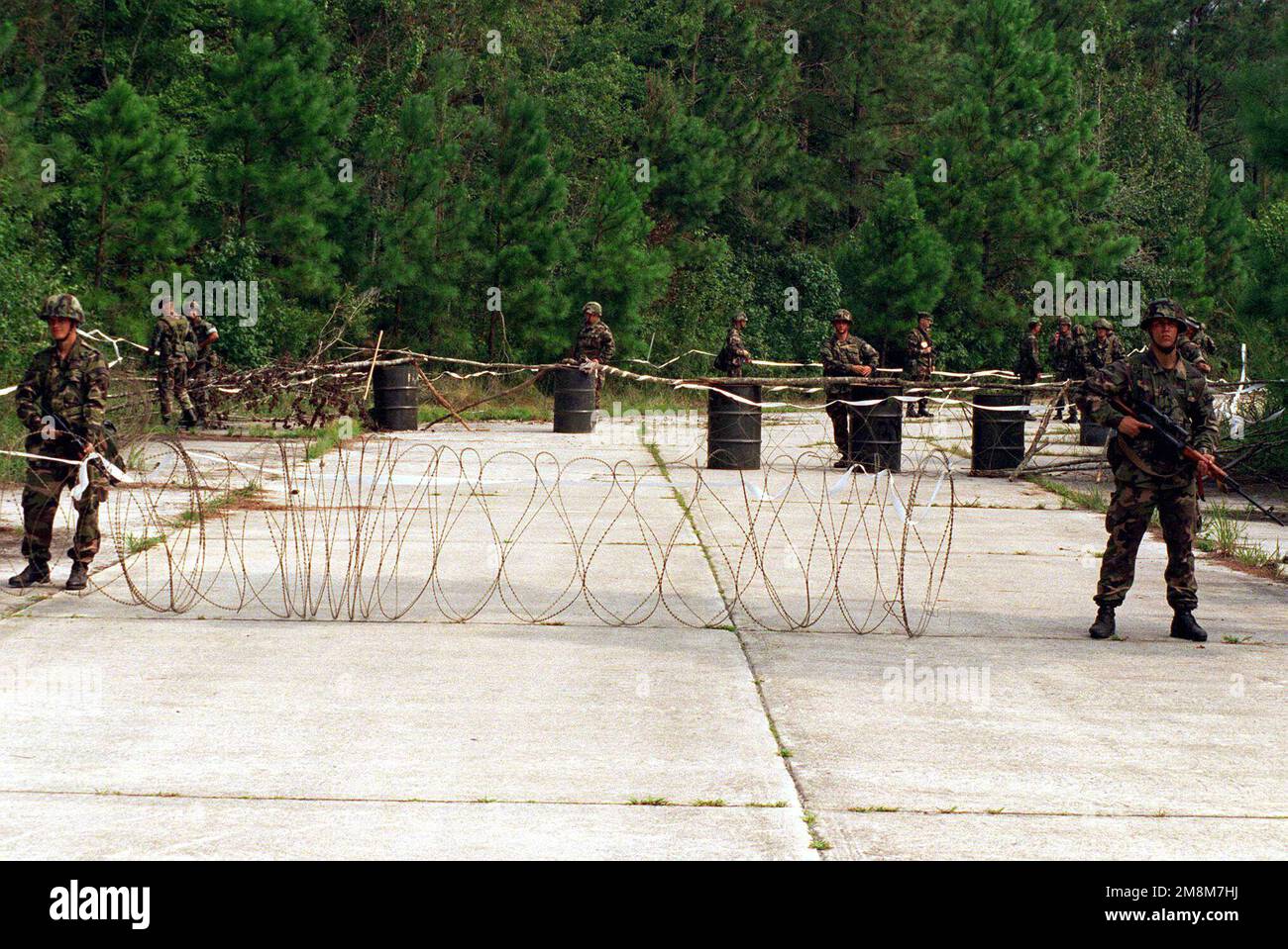 Security personnel block road hi-res stock photography and images - Alamy
