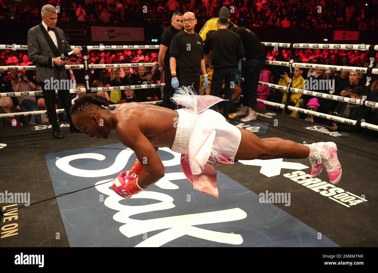 KSI celebrates by doing pushups after victory in the cruiserweight bout ...