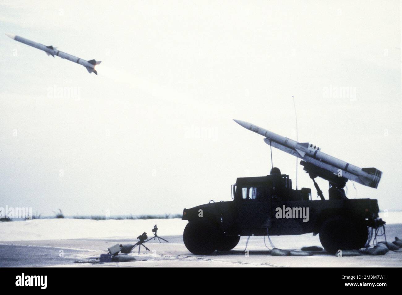 An AIM-120A AMRAMM missile is launched from a High-Mobility ...