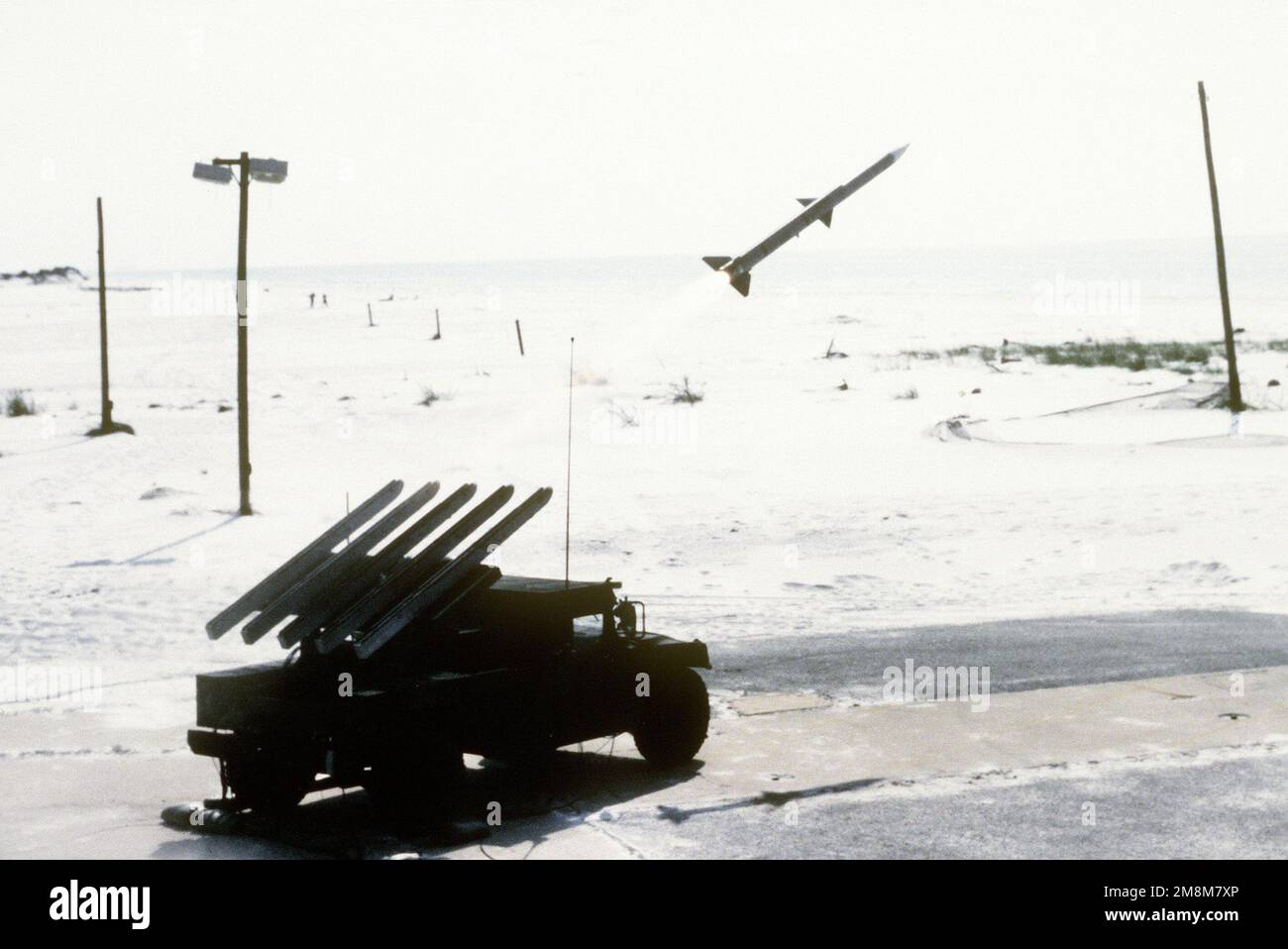 An AIM-120A AMRAMM missile is launched from a High-Mobility ...