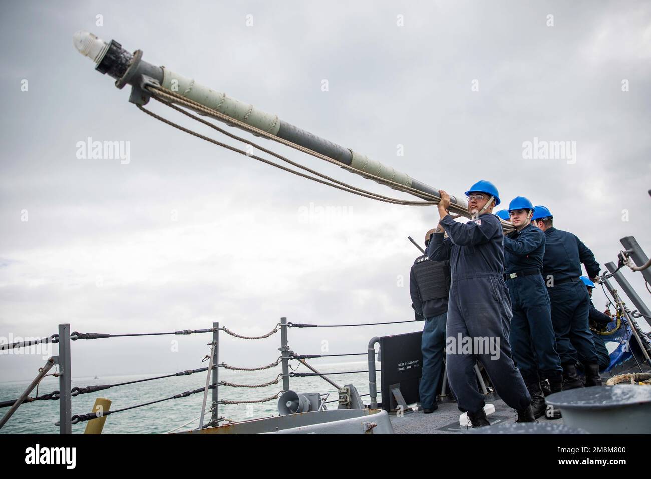 Naval Station Rota, Spain. 2nd Jan, 2023. Sailors remove a jackstaff on ...