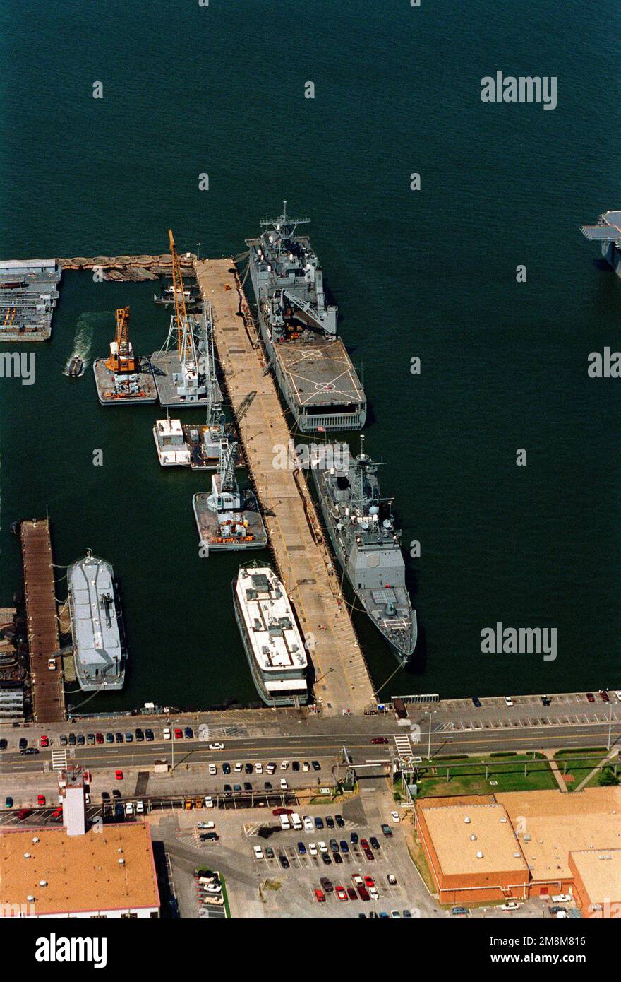 An aerial view of a section of the Norfolk Naval Base showing a Whidbey ...