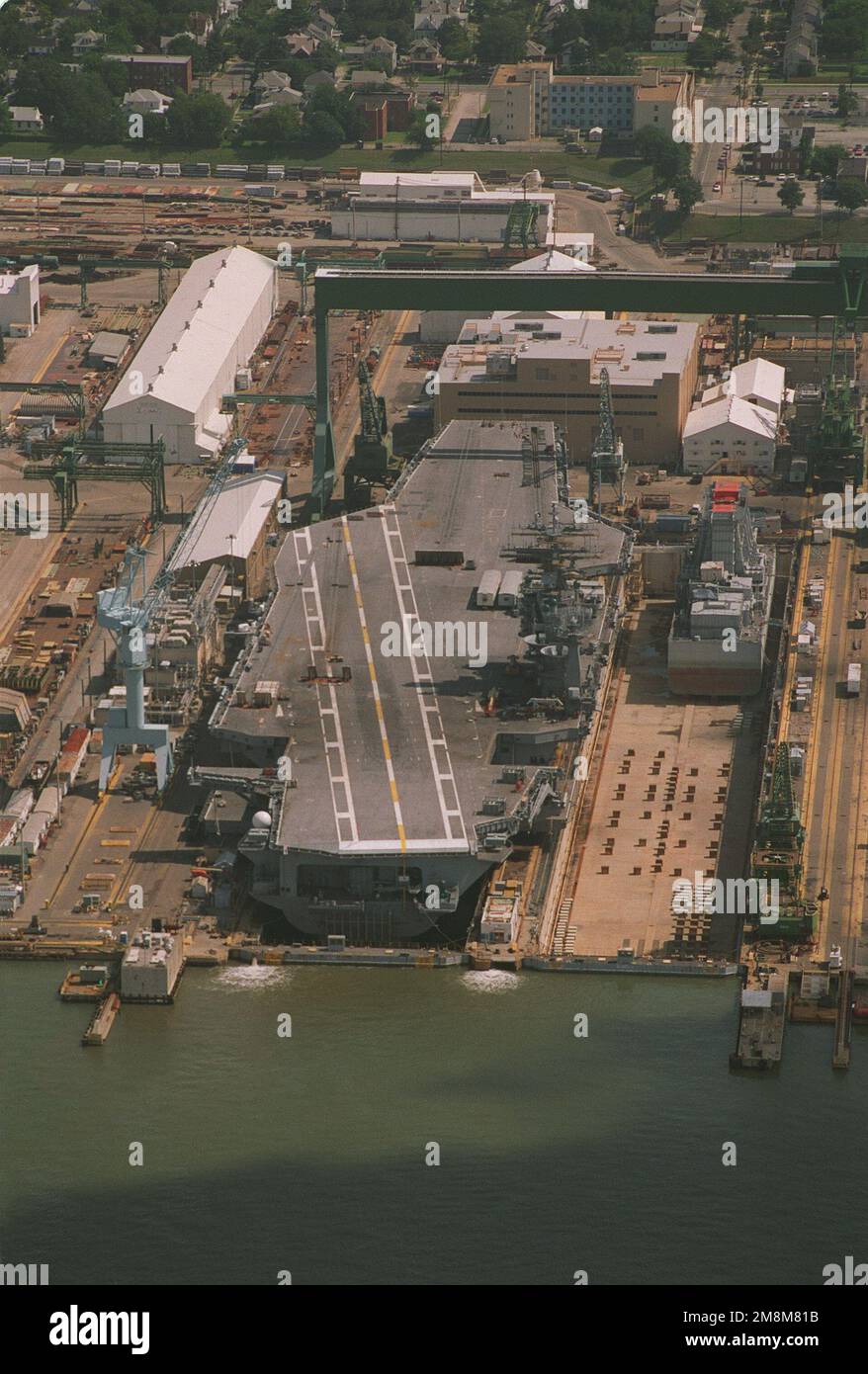 An aerial stern-on view of the nuclear-powered aircraft carrier USS ...