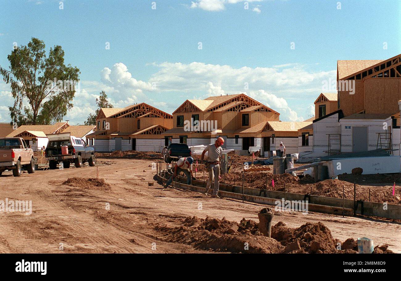 Three-bedroom duplex homes are under construction. Base: Davis-Monthan ...